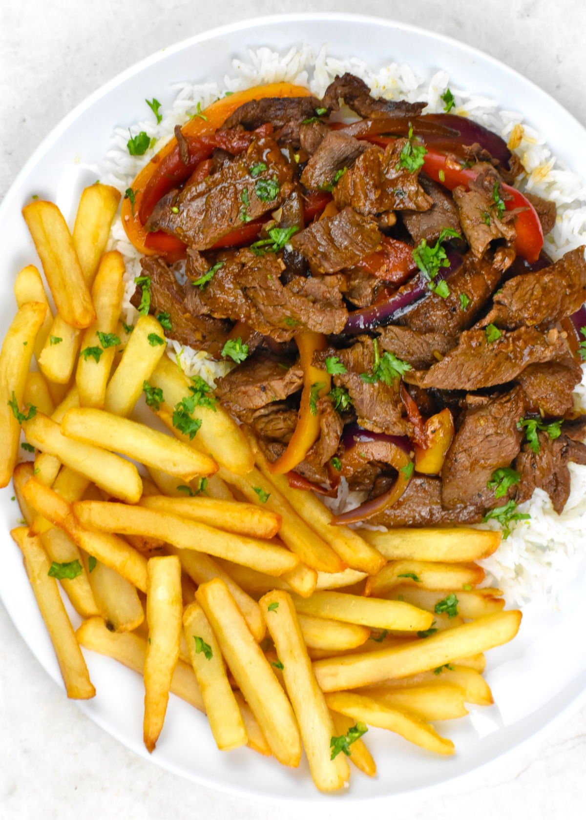 Lomo Saltado (Peruvian Beef Stir Fry) - GypsyPlate